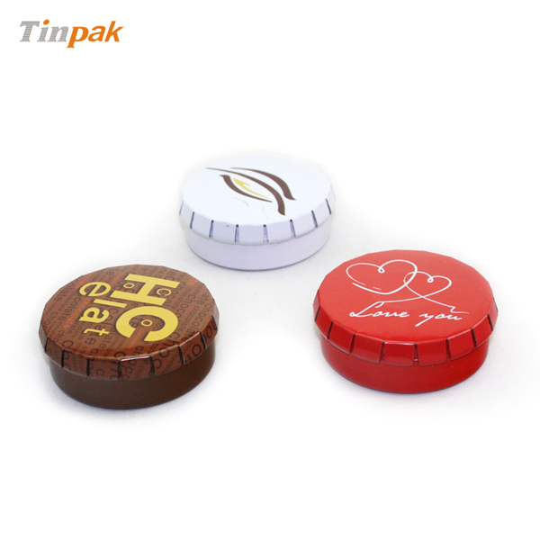 small round click clack mint candy tin box